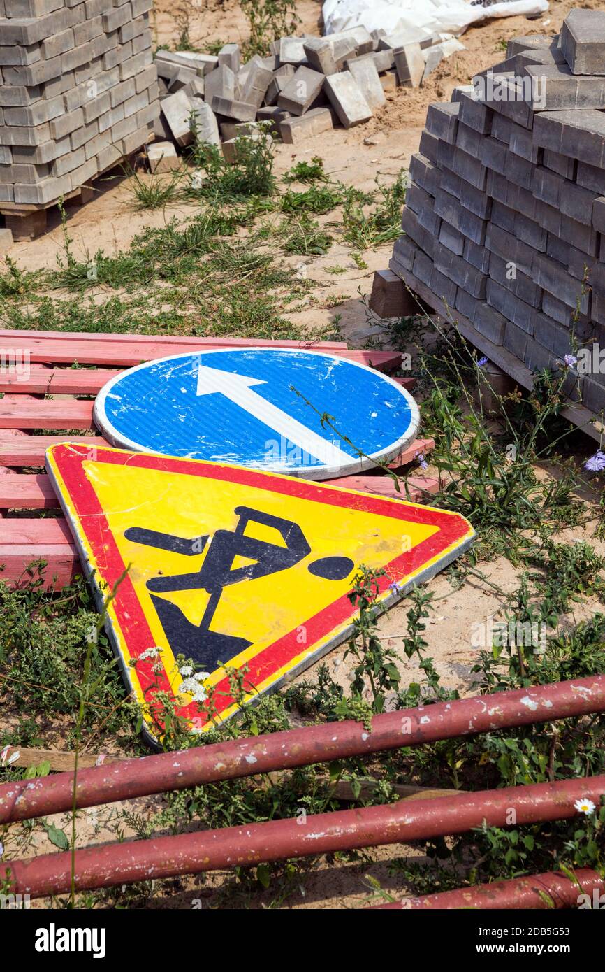 fallen and broken road signs for repair or construction work Stock ...