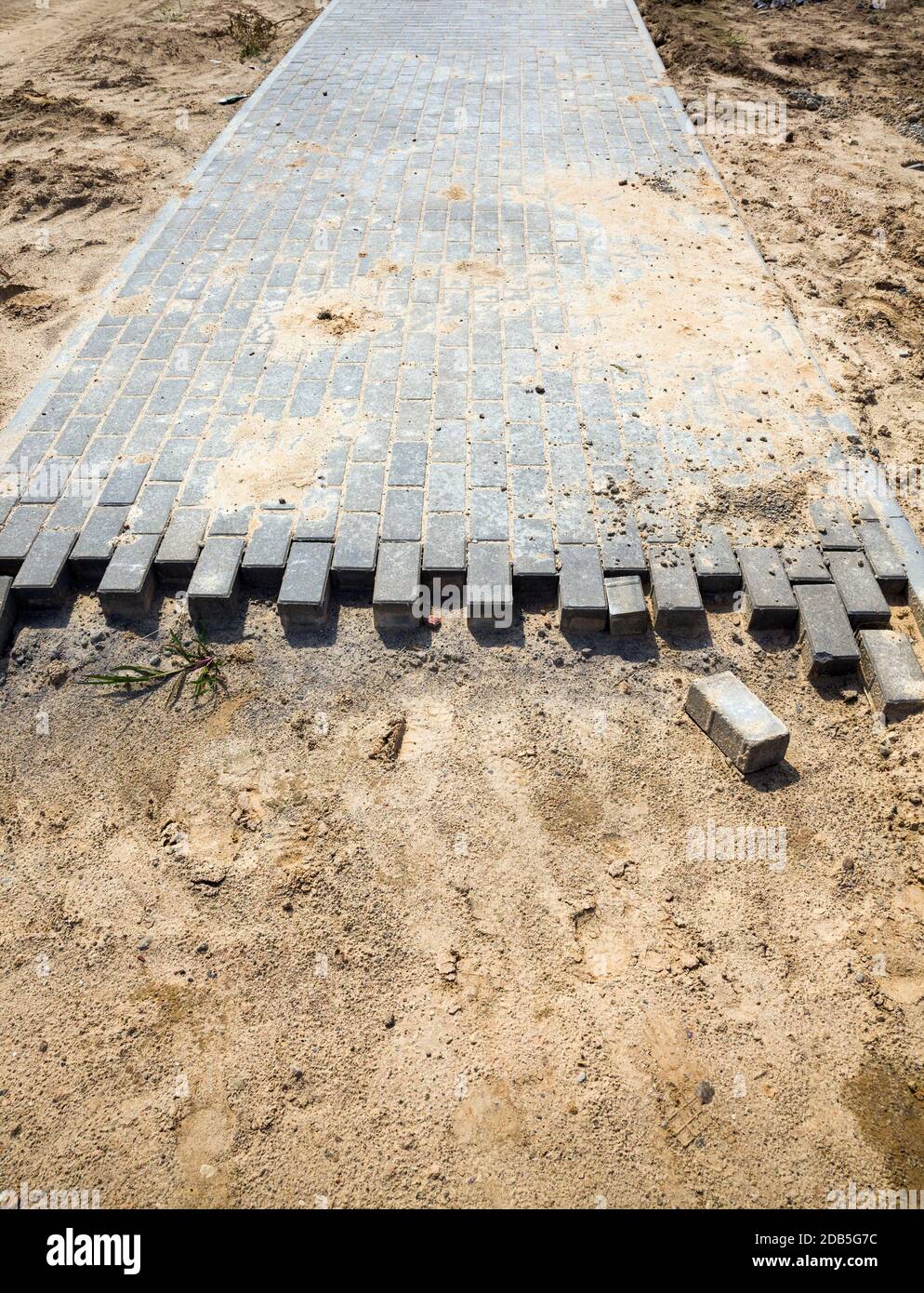 construction of a new road for the movement of cars and pedestrians, a ...