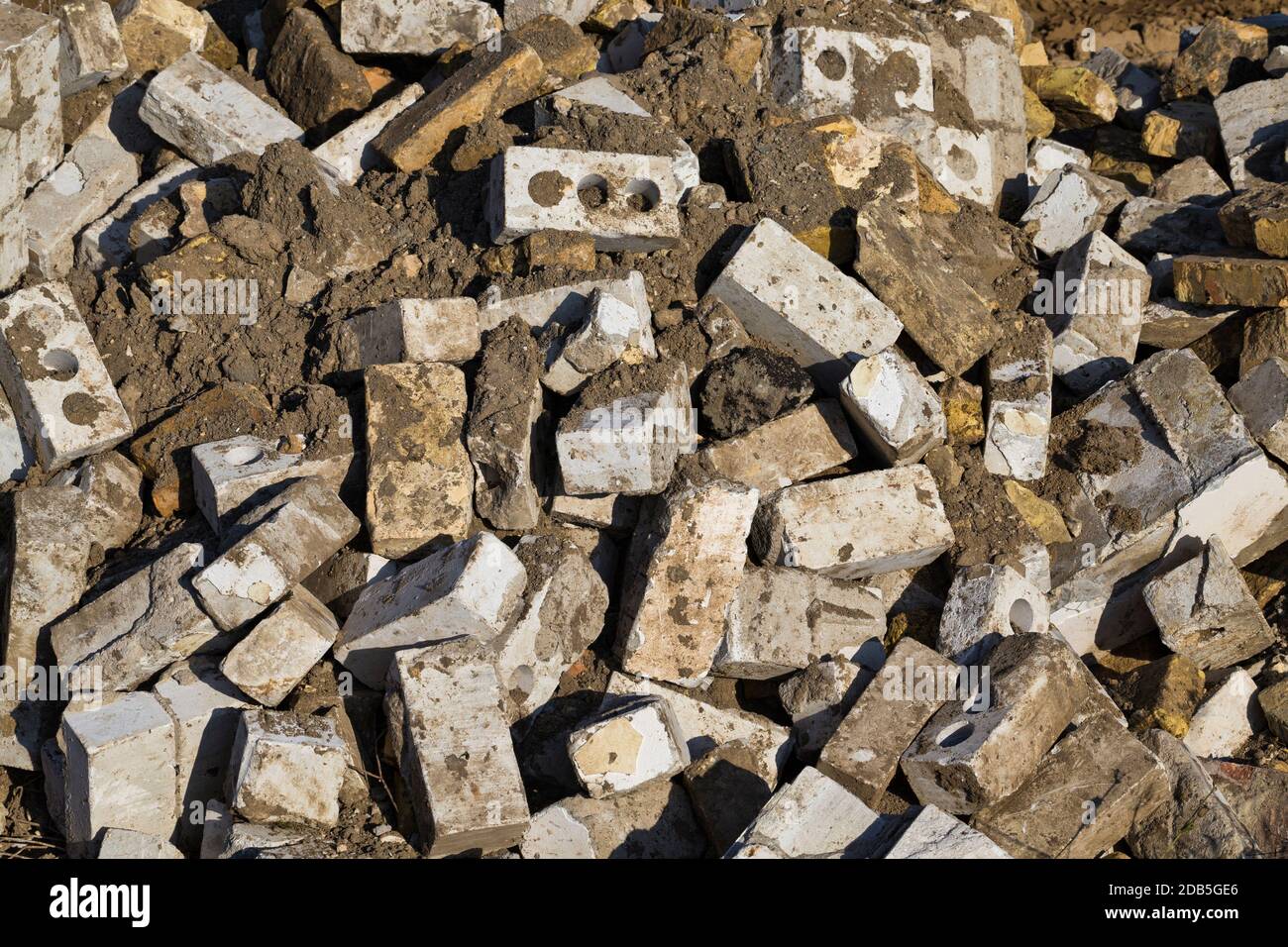 bricks and other broken building materials piled up after the ...