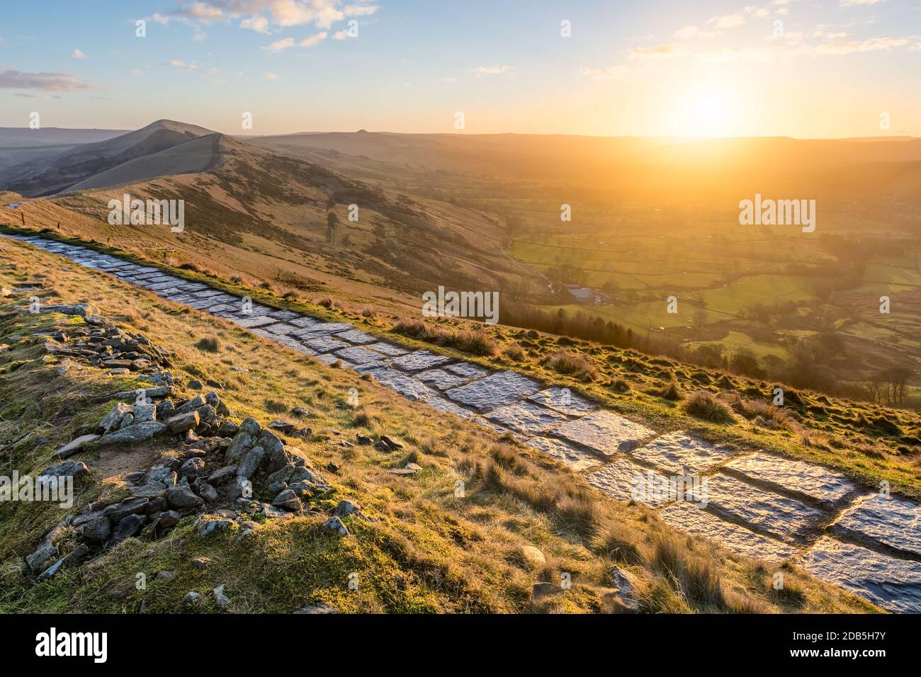 Stone walking path running along ridge of Mam Tor in the British Peak ...