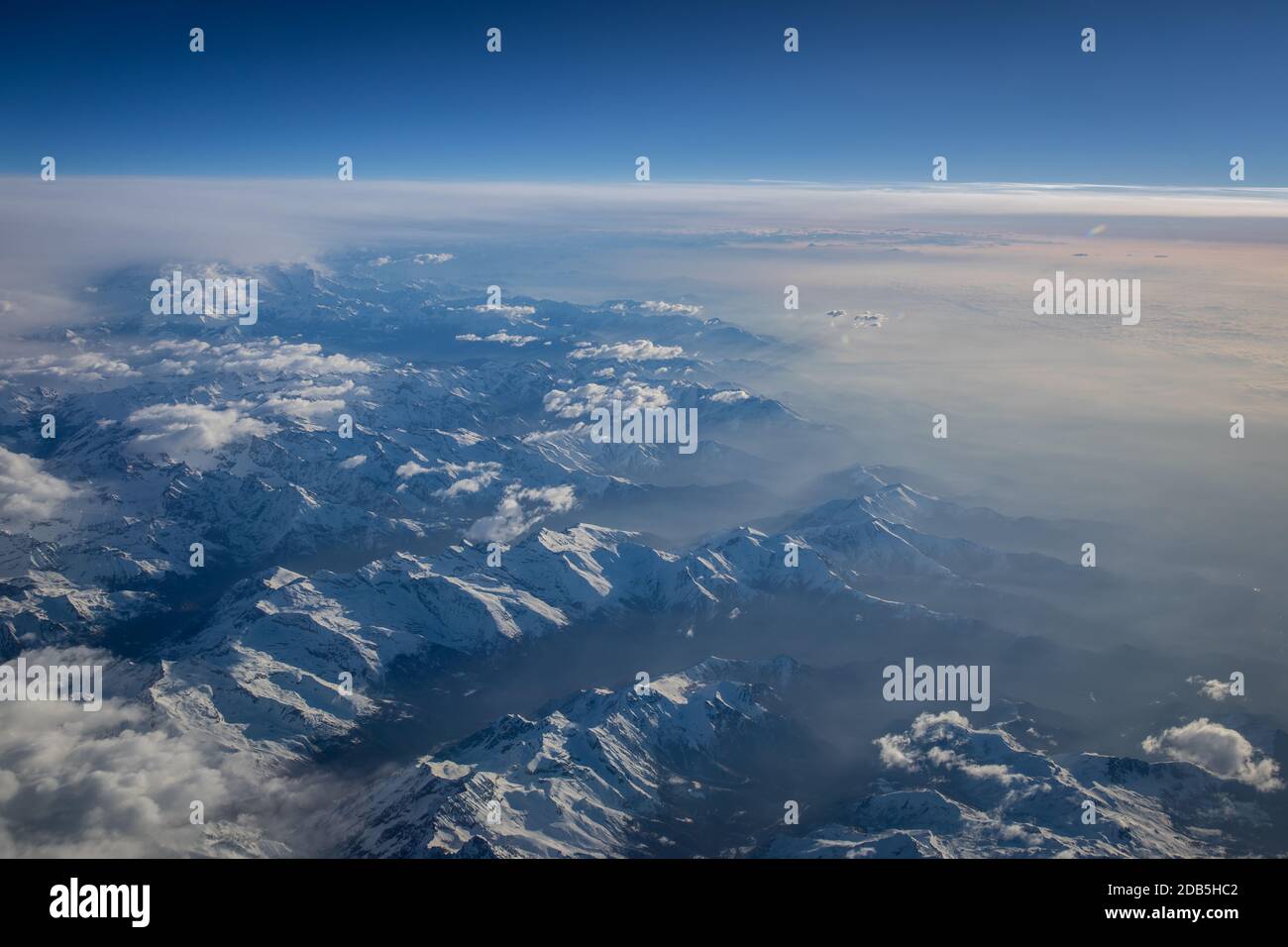 View from a cockpit of a commercial airliner airplane over a beautiful ...