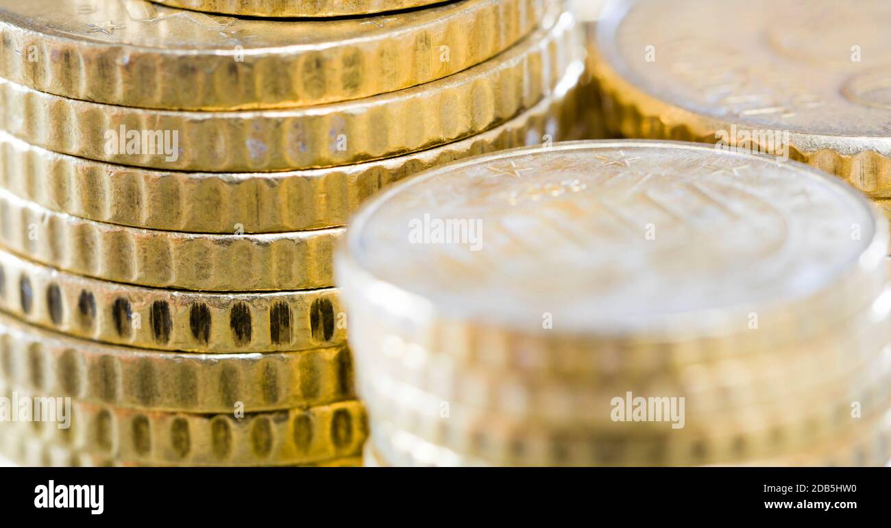 illuminated by Golden light coins, close-up of metal money Stock Photo ...