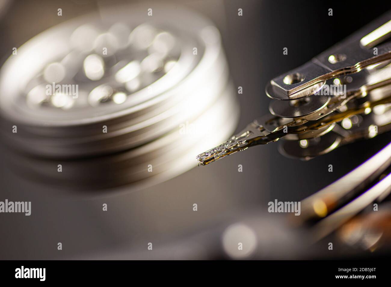 Detail of the inside of a hard disk with the reading head in operation ...