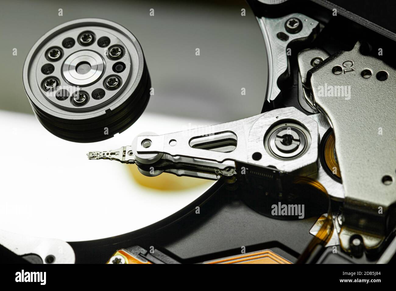 Detail of the inside of a hard disk with the reading head in operation ...