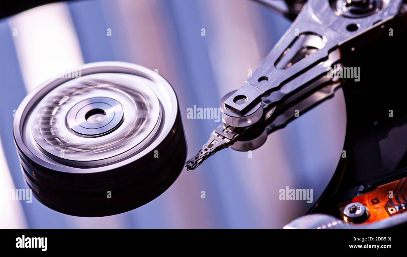 Detail of the inside of a hard disk with the reading head in operation ...