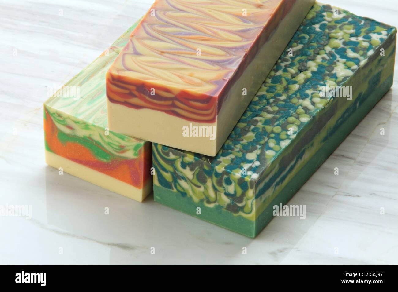 Blocks of artisanal cold process soaps being cured Stock Photo - Alamy
