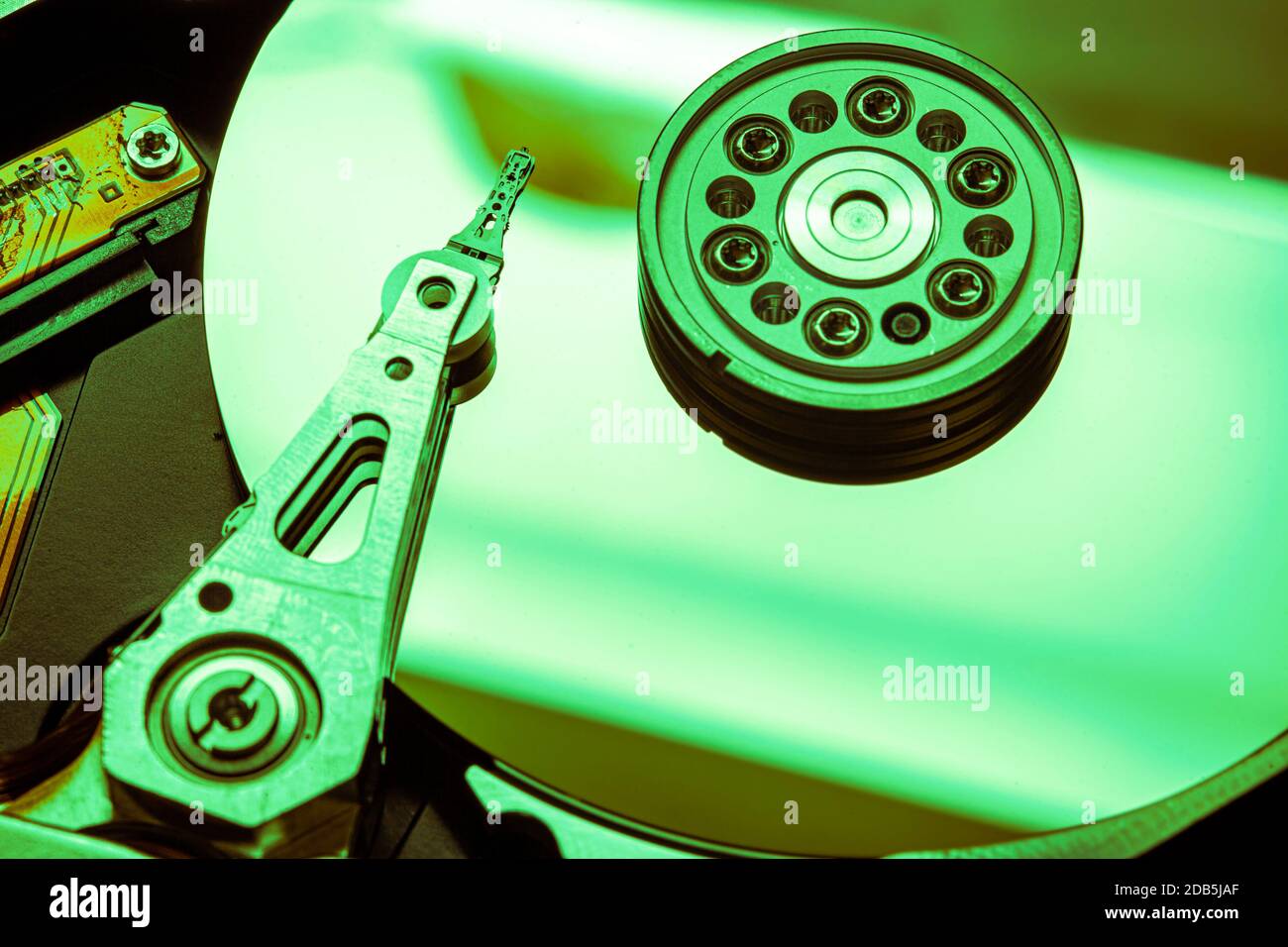 Detail of the inside of a hard disk with the reading head in operation ...