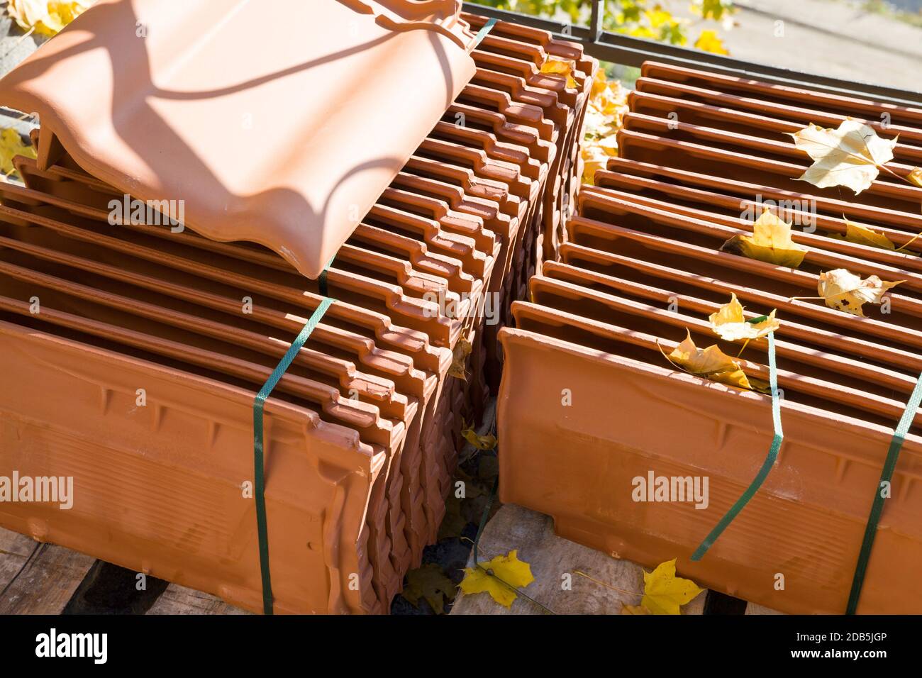 modern real clay tiles Packed in bundles, used during the construction ...