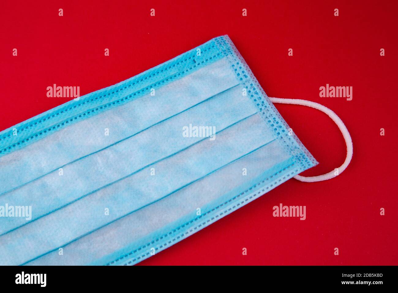 Medical mask. Medical protective masks on red background. Disposable ...