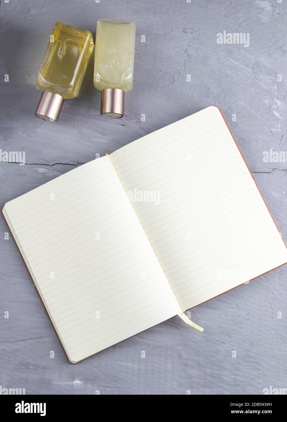 Spa with natural olive soap and sea salt and an open notebook for ...