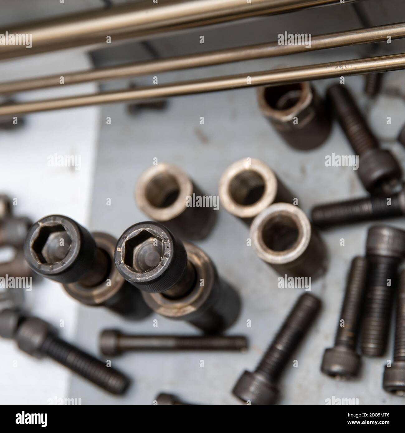 bolts and nuts in a box in a factory repair machine Stock Photo - Alamy