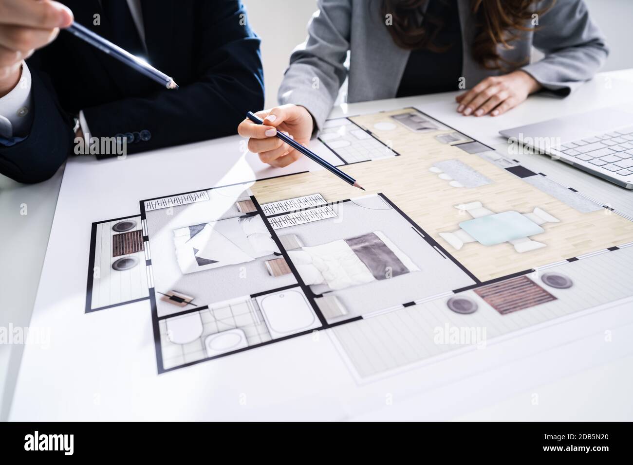 Close-up Of Two Architects Hands Working On Blueprint Stock Photo - Alamy