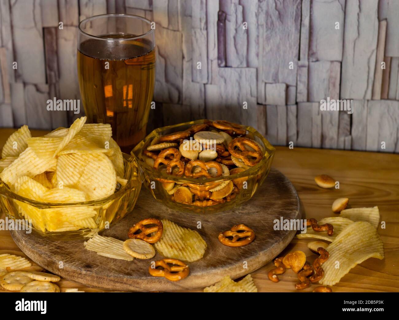 Cold beer snacks and potato chips Stock Photo - Alamy