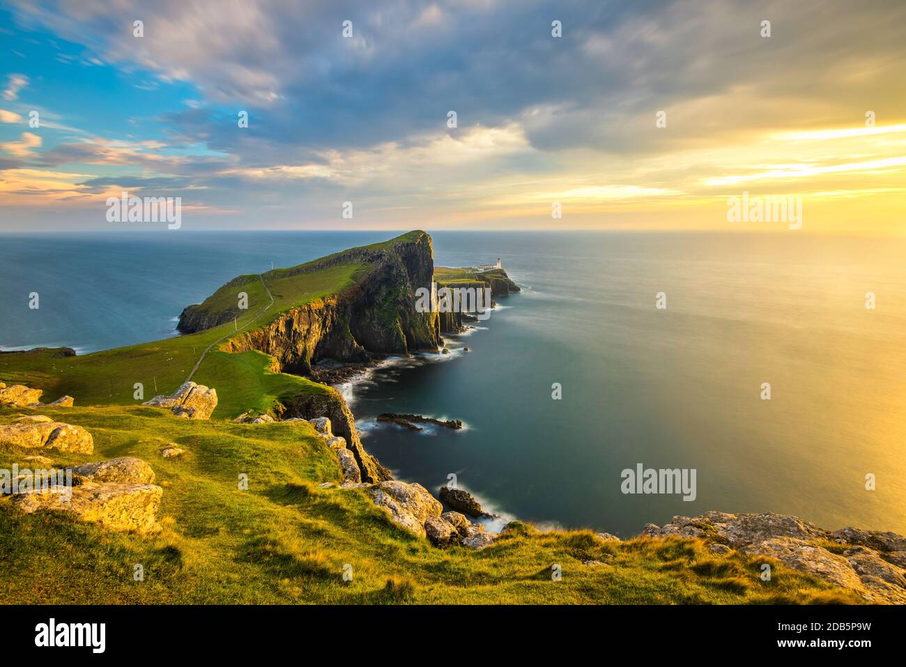Beautiful golden light at sunset at Neist Point Lighthouse on the Isle ...