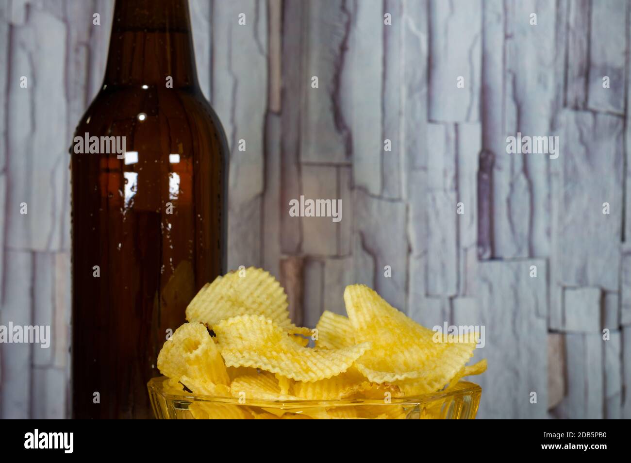 Cold beer and potato chips Stock Photo - Alamy
