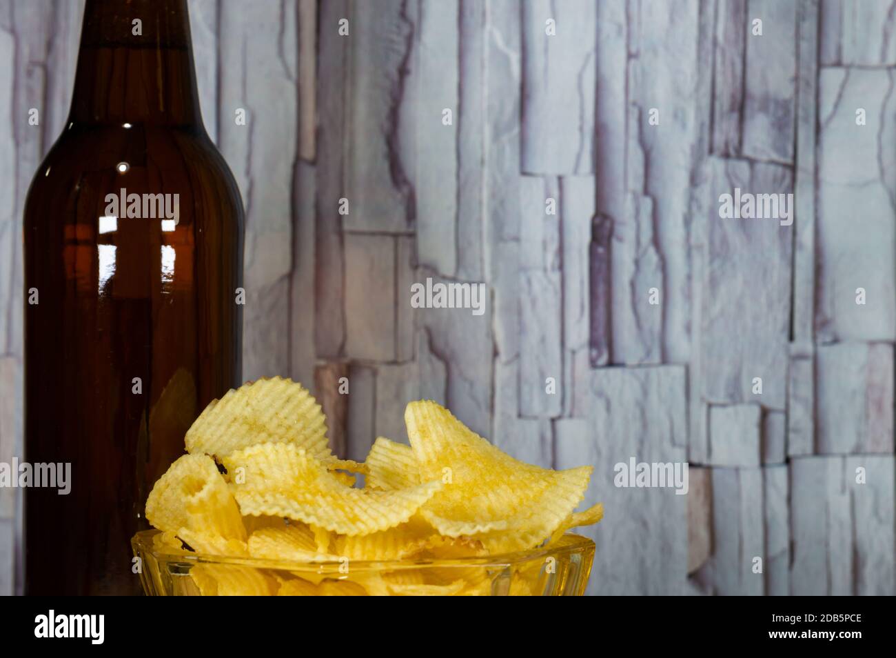 Cold beer and potato chips Stock Photo - Alamy