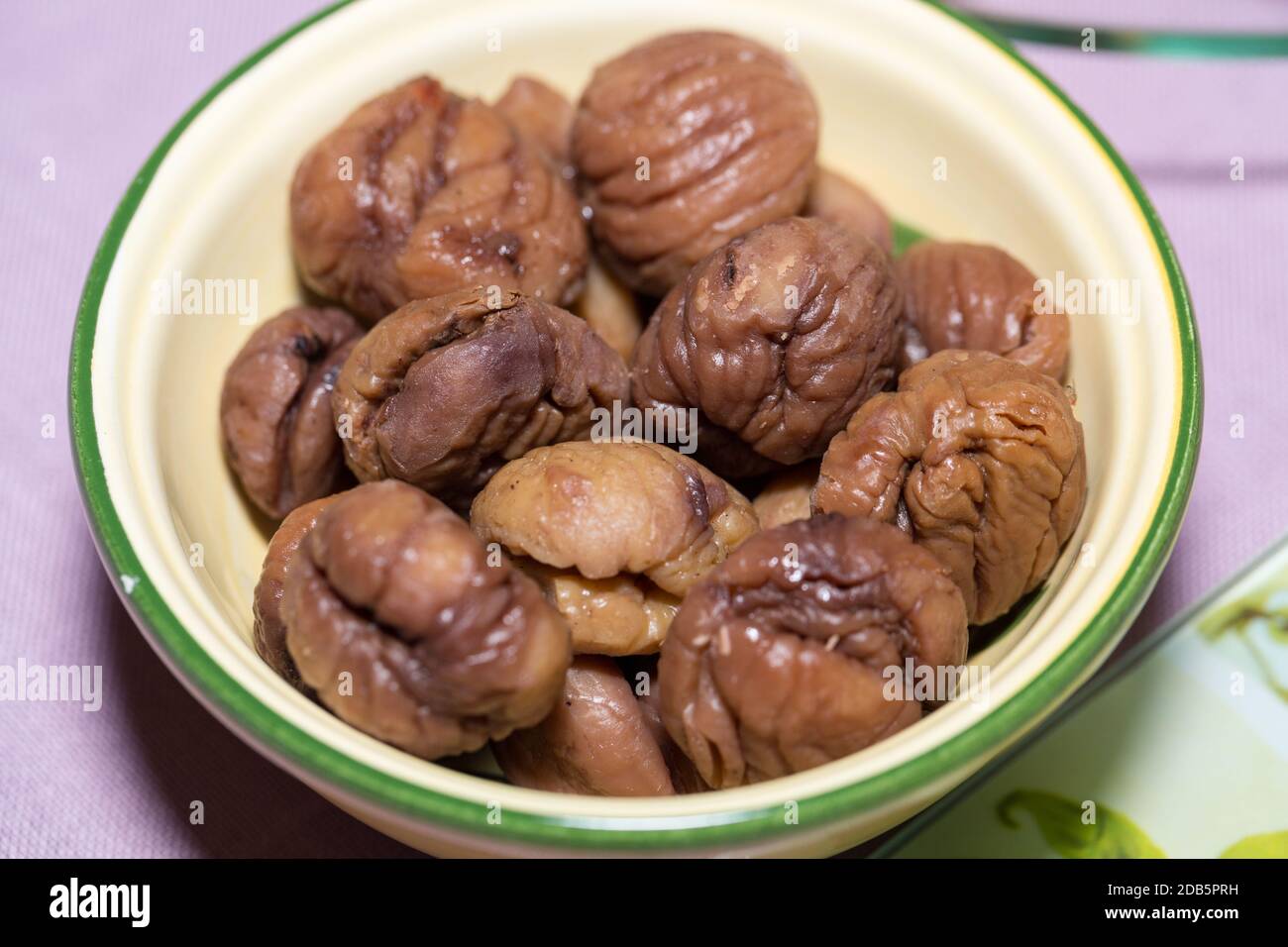 roast pickled chestnuts in bowl Stock Photo - Alamy