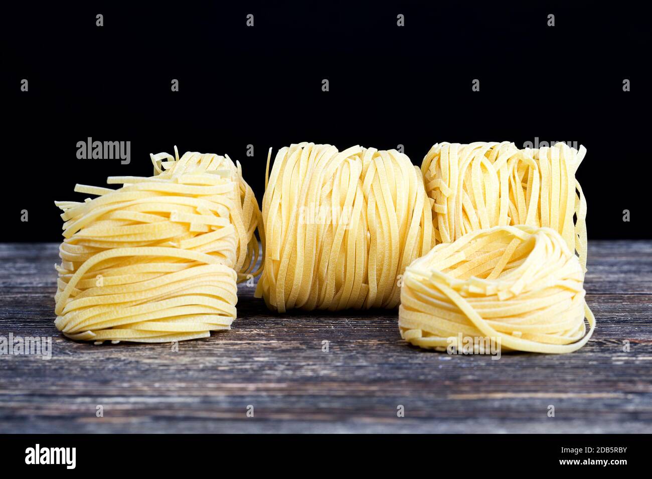 Curled noodles hi-res stock photography and images - Alamy