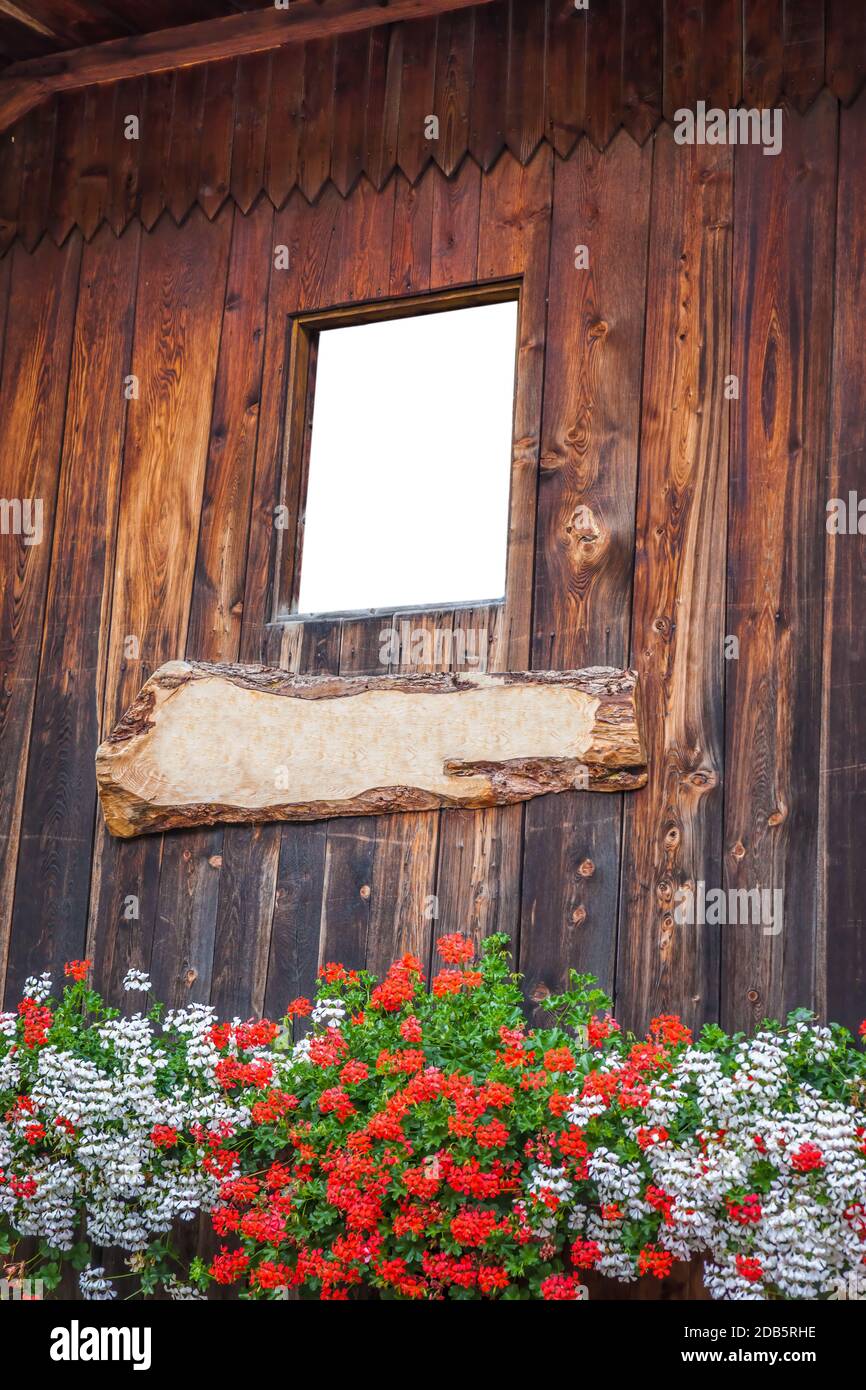 Wooden window on farmhouse (isolated), with butem flower arrangements ...