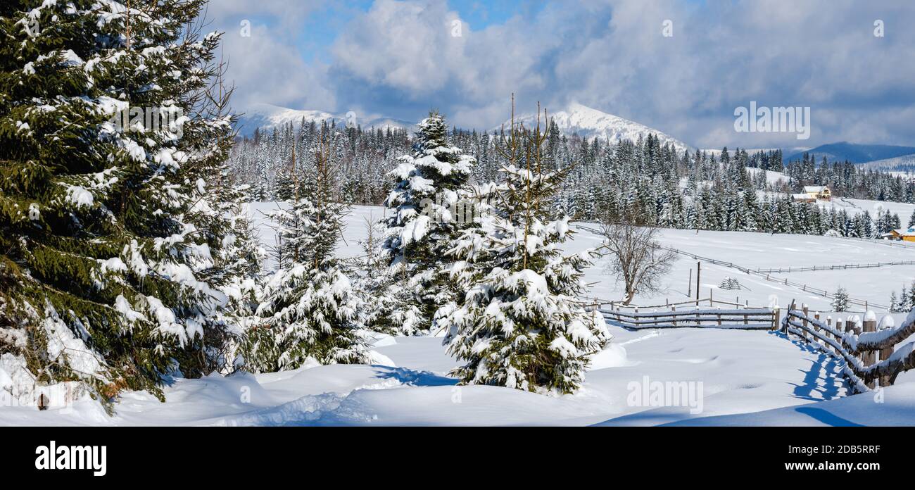 Winter remote alpine mountain village outskirts, countryside hills ...