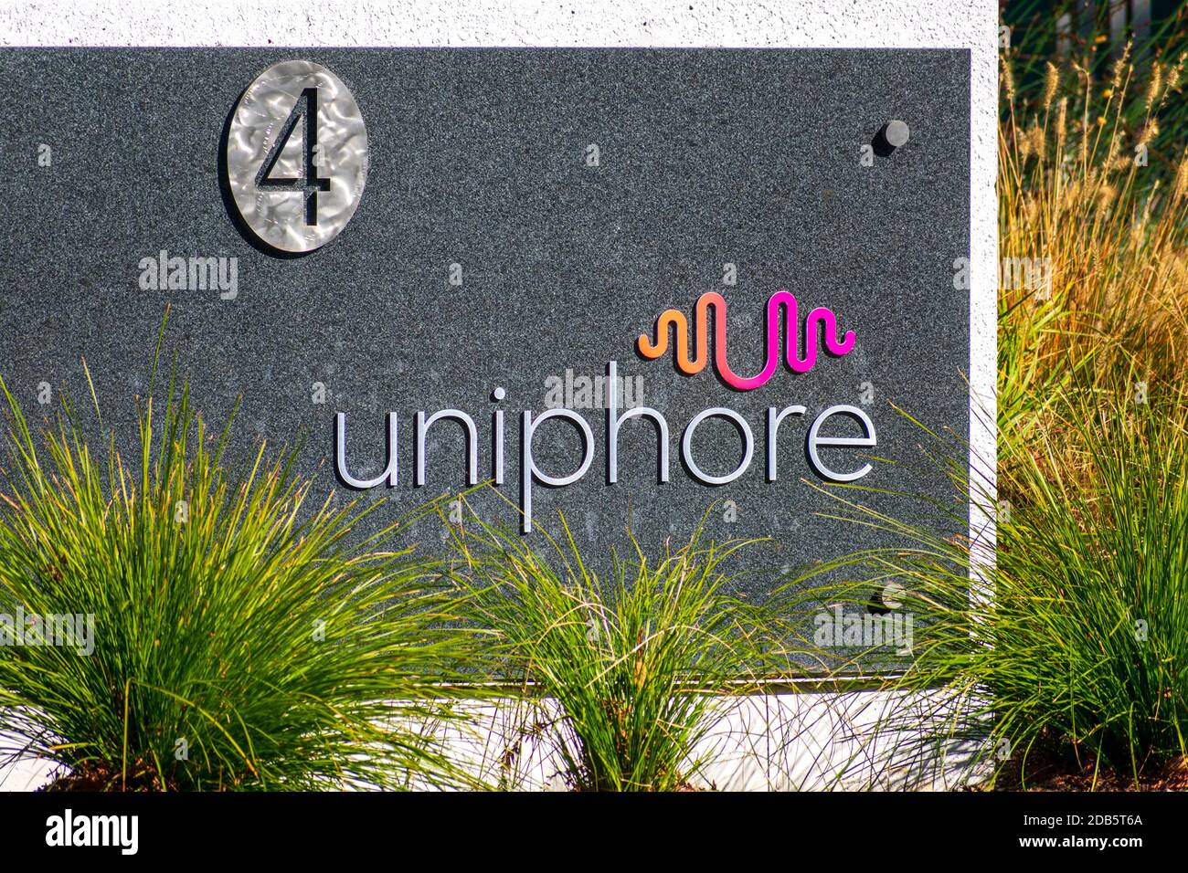 Uniphore sign logo at headquarters. Uniphore is a Conversational AI ...