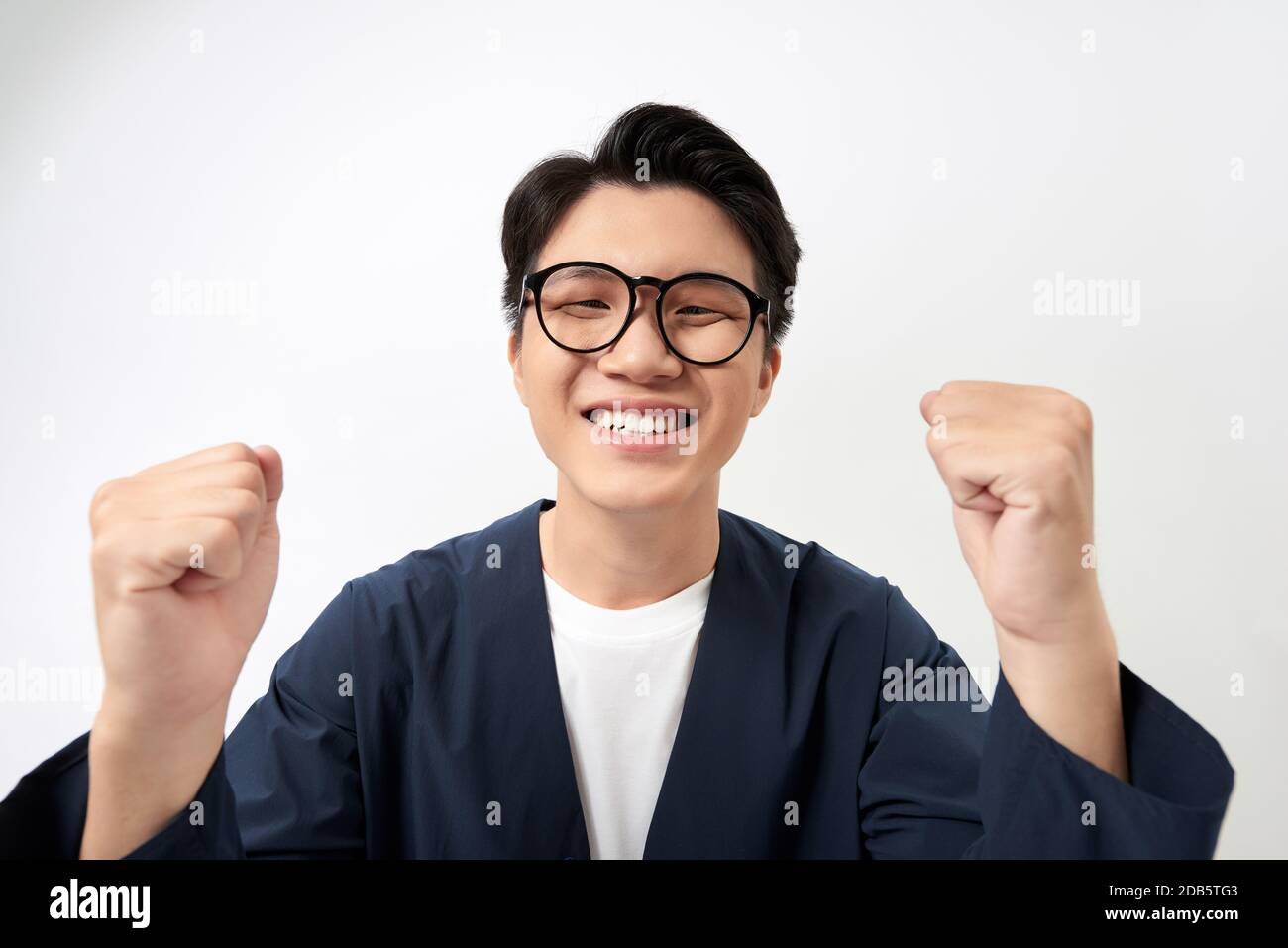Excited chinese man hi-res stock photography and images - Alamy