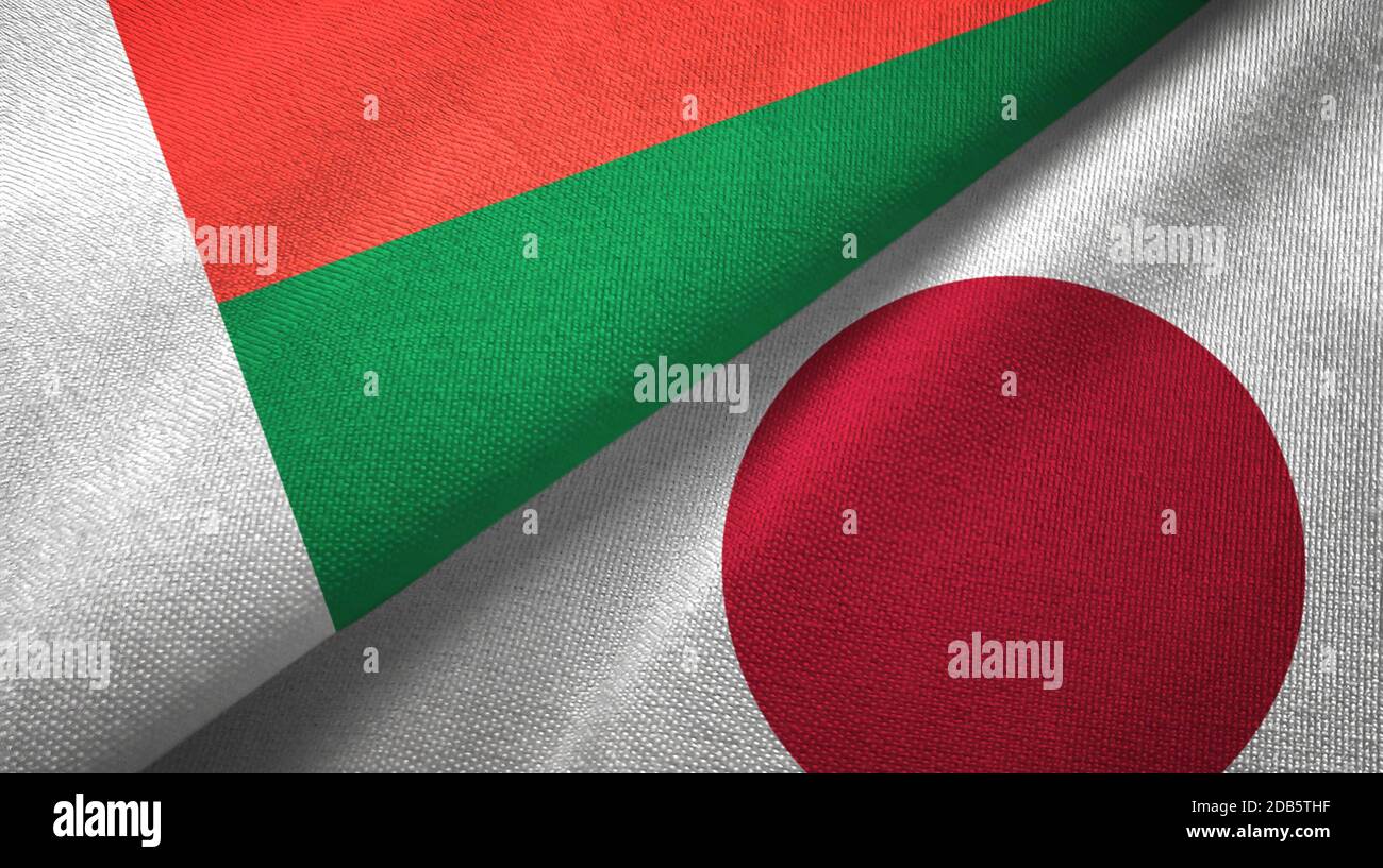 Madagascar and Japan two flags textile cloth, fabric texture Stock ...