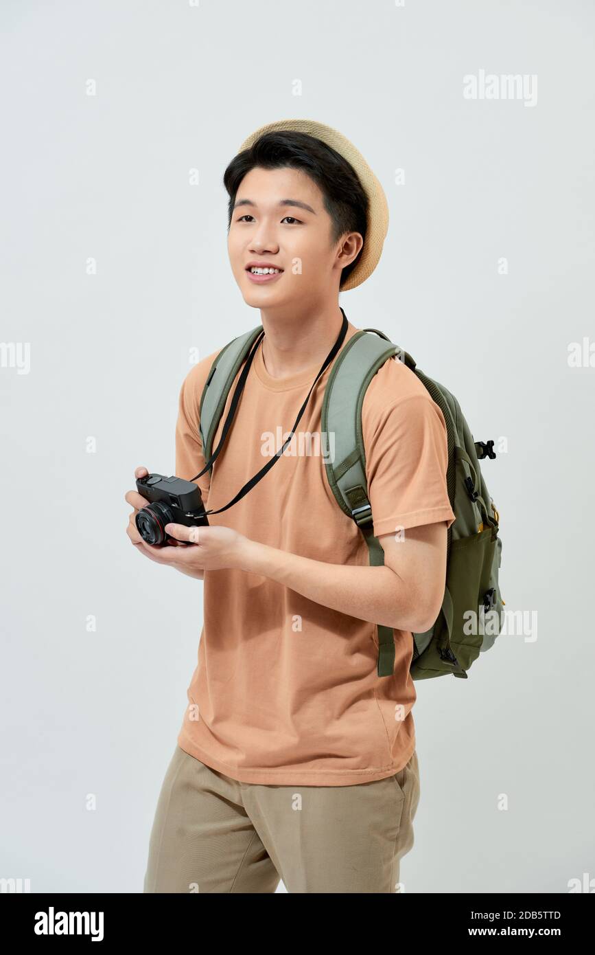 Full length portrait of happy tourist photographer man on white ...