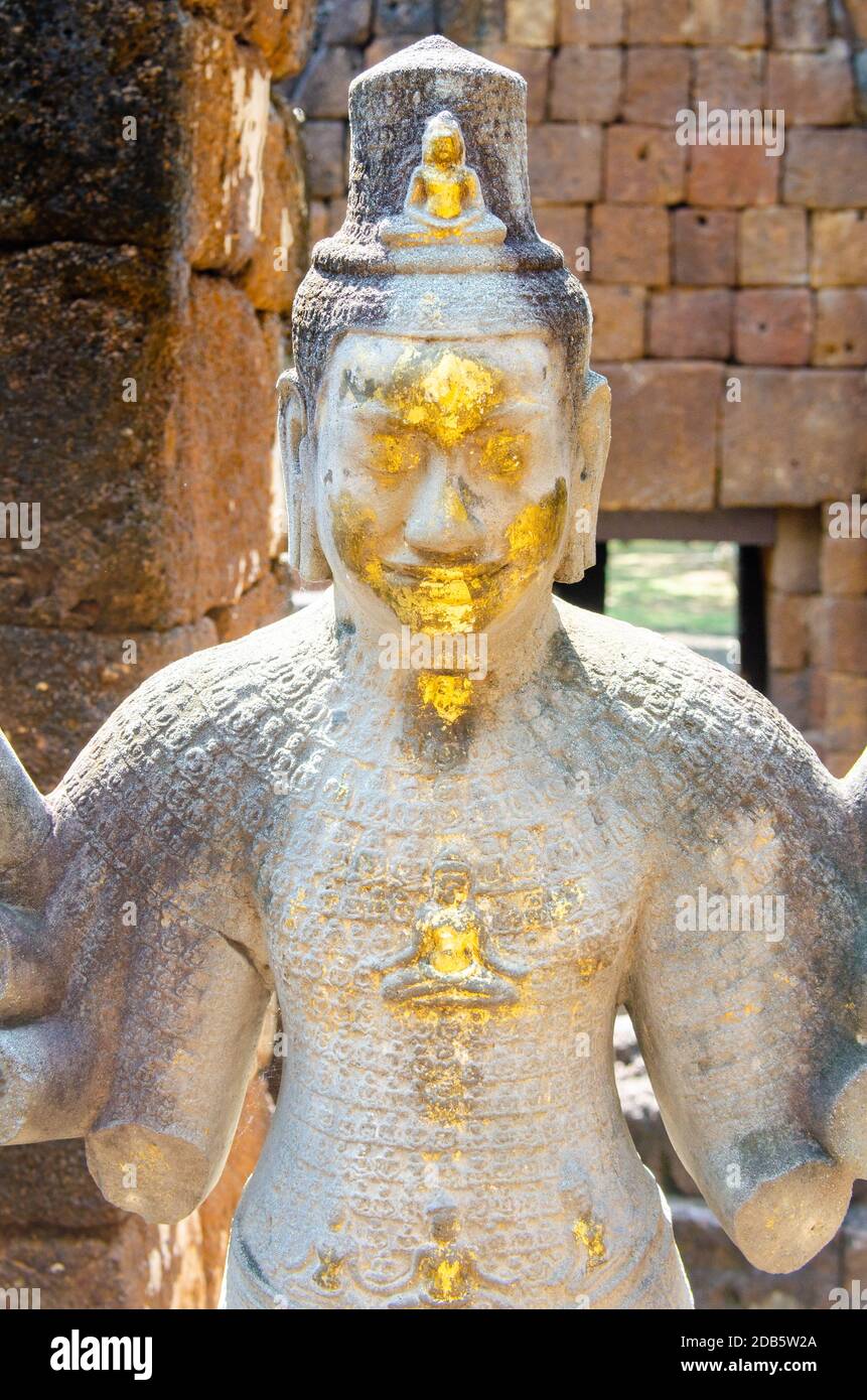 Partially gilded inage of a deity, possibly Jayavarman VII in Prasat ...