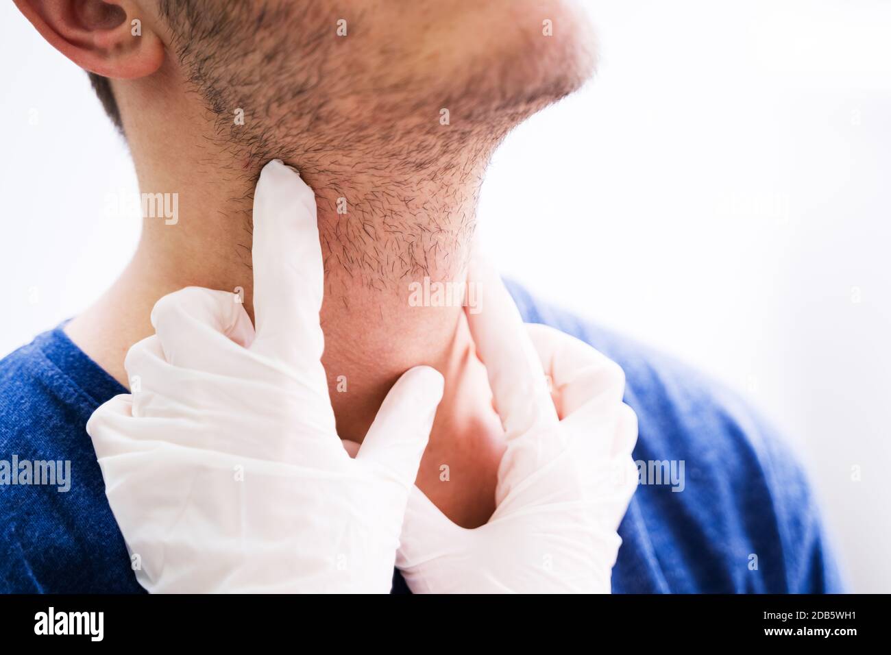 Doctor Performing Physical Exam Palpation Of The Thyroid Gland Stock ...