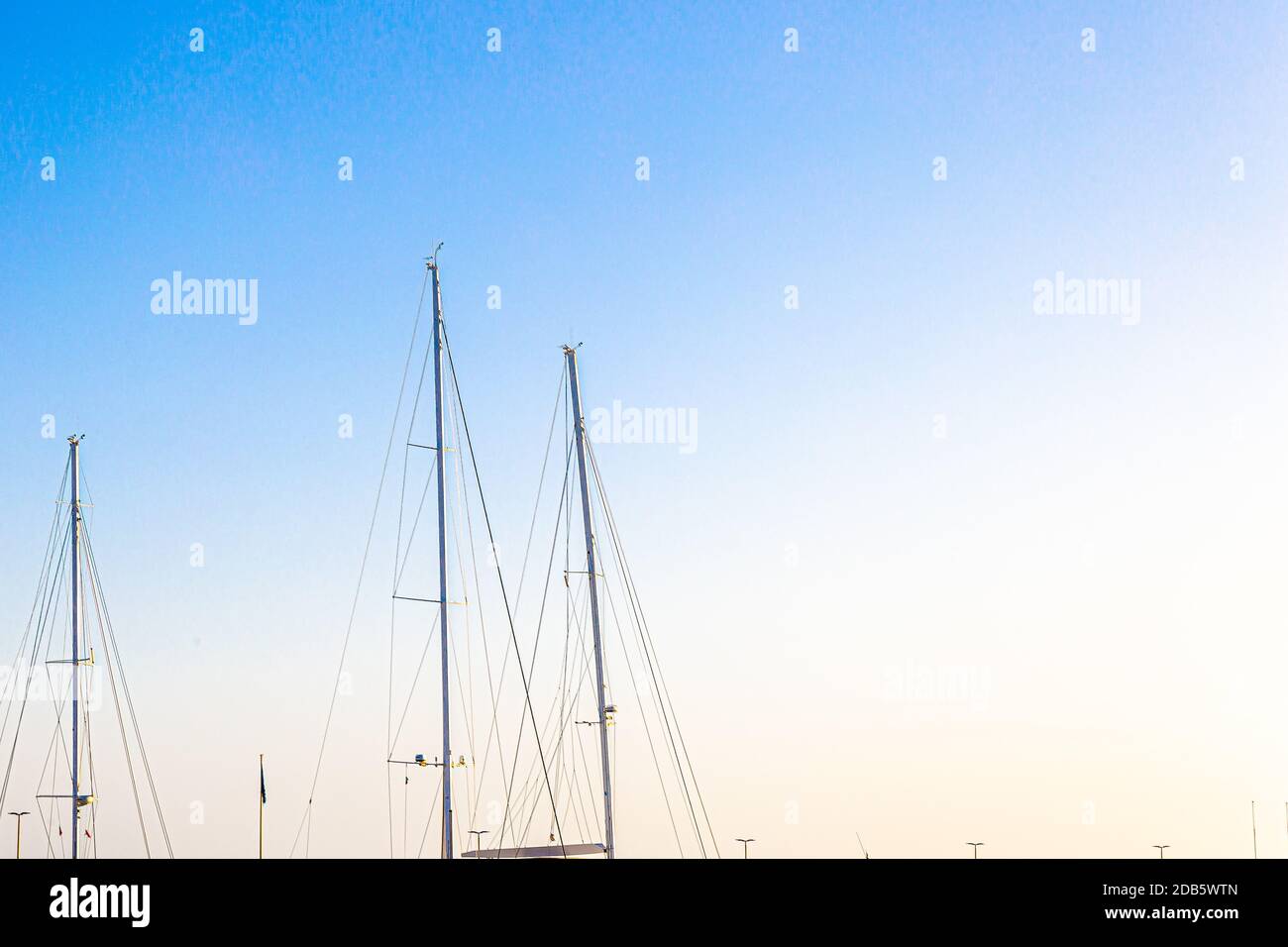 the masts of sailing boats in the beautiful blue sky of spring Stock ...