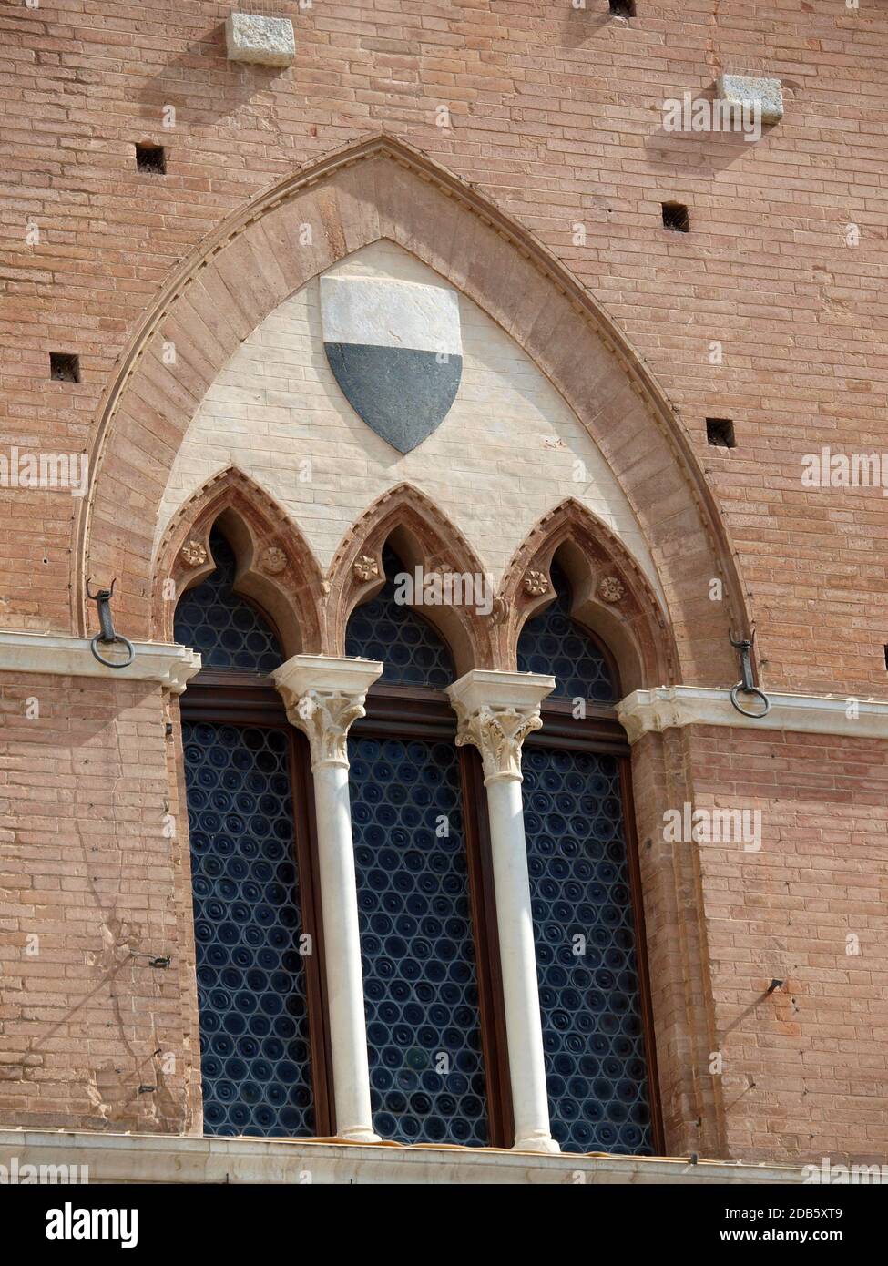 Beautiful Gothic windows in Italy Stock Photo - Alamy