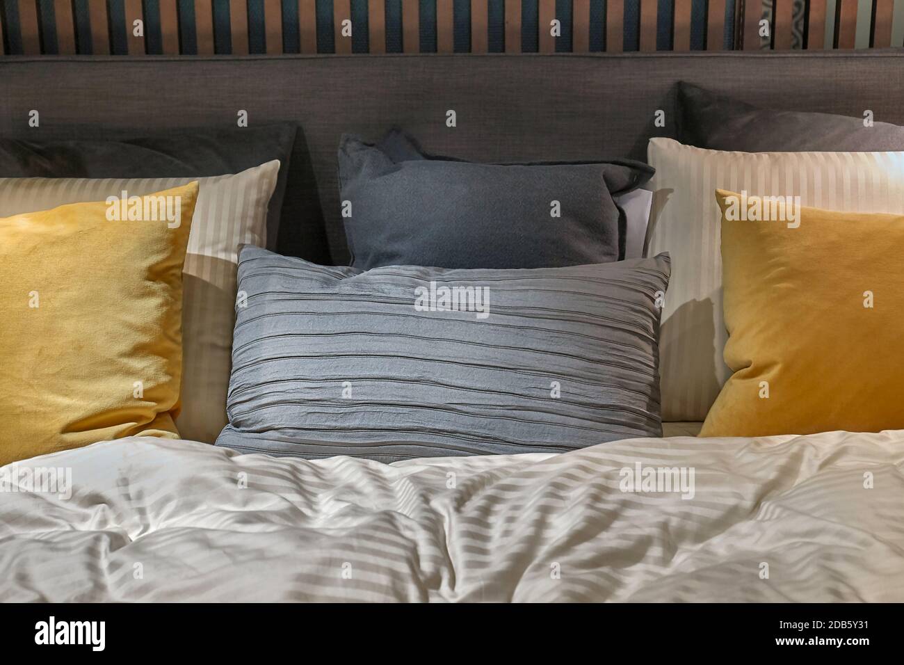 Bedroom bed with pillows Stock Photo - Alamy