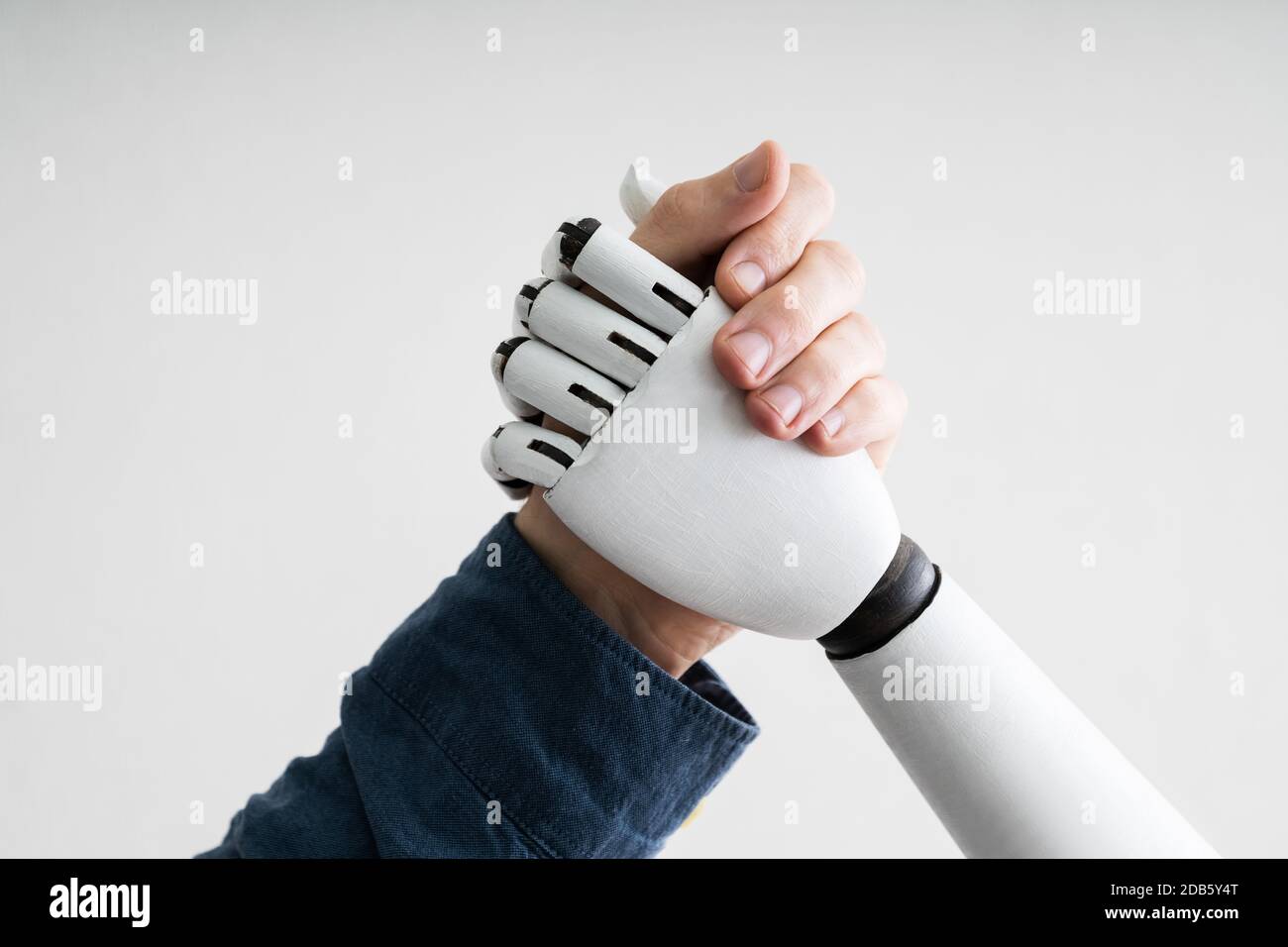 Machine human shake hands hi-res stock photography and images - Alamy