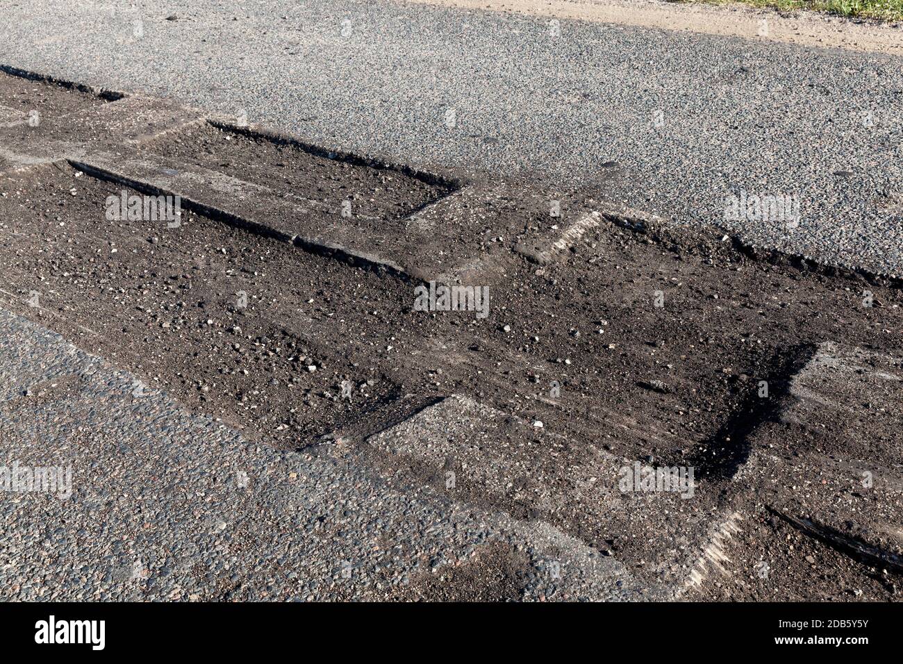 the cut part of the road asphalt roadbed during the repair work Stock ...