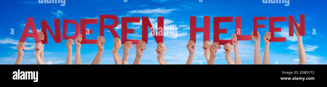 People Hands Holding Colorful German Word Anderen Helfen Means Help ...