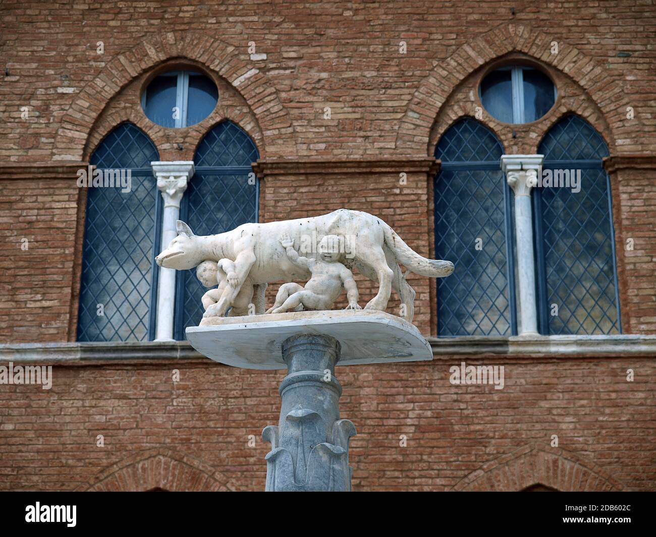 Siena - column with the she-wolf in front of the Duomo facade Stock ...