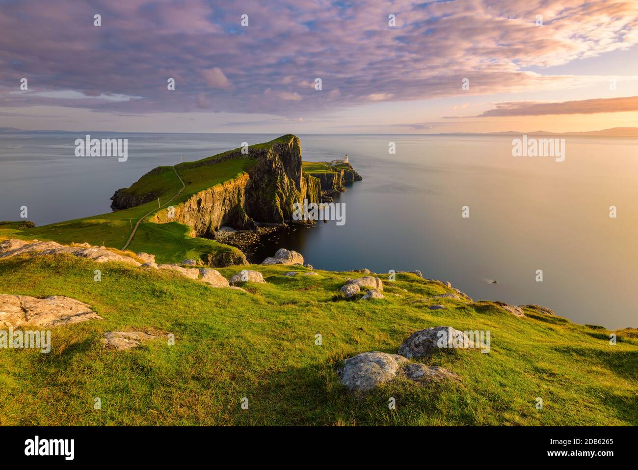 Neist Point Lighthouse on the Isle of Skye on a summer evening Stock ...