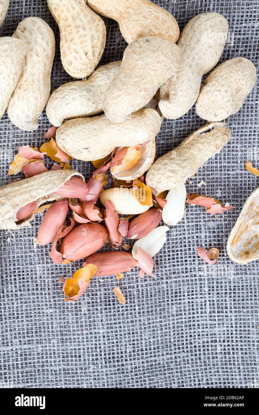 a large number of peeled nuts peanut during cooking, close-up of the ...