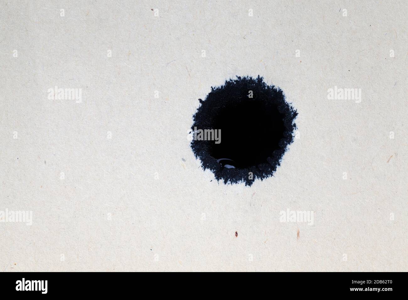 black spots ink blotches on an old yellowed piece of paper Stock Photo ...