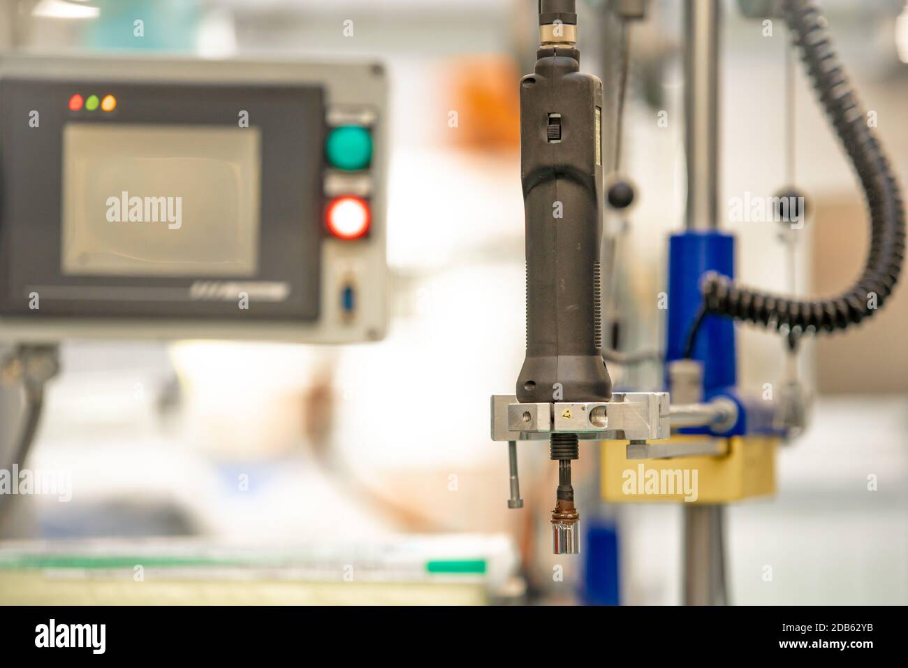 electric screwdriver and grinder on the production line in the factory ...