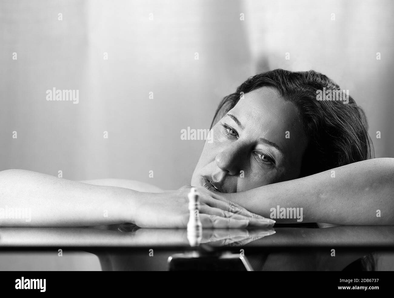 sighing for the white lady, chess Stock Photo - Alamy