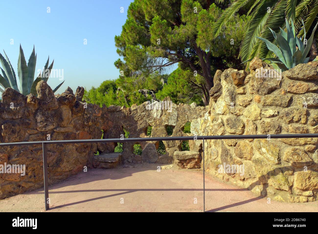 fence stone of a building designed by Gaudi in park Guel in Barcelona ...