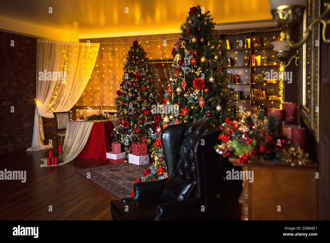 Christmas interior of the dark living room of the house. Christmas tree ...