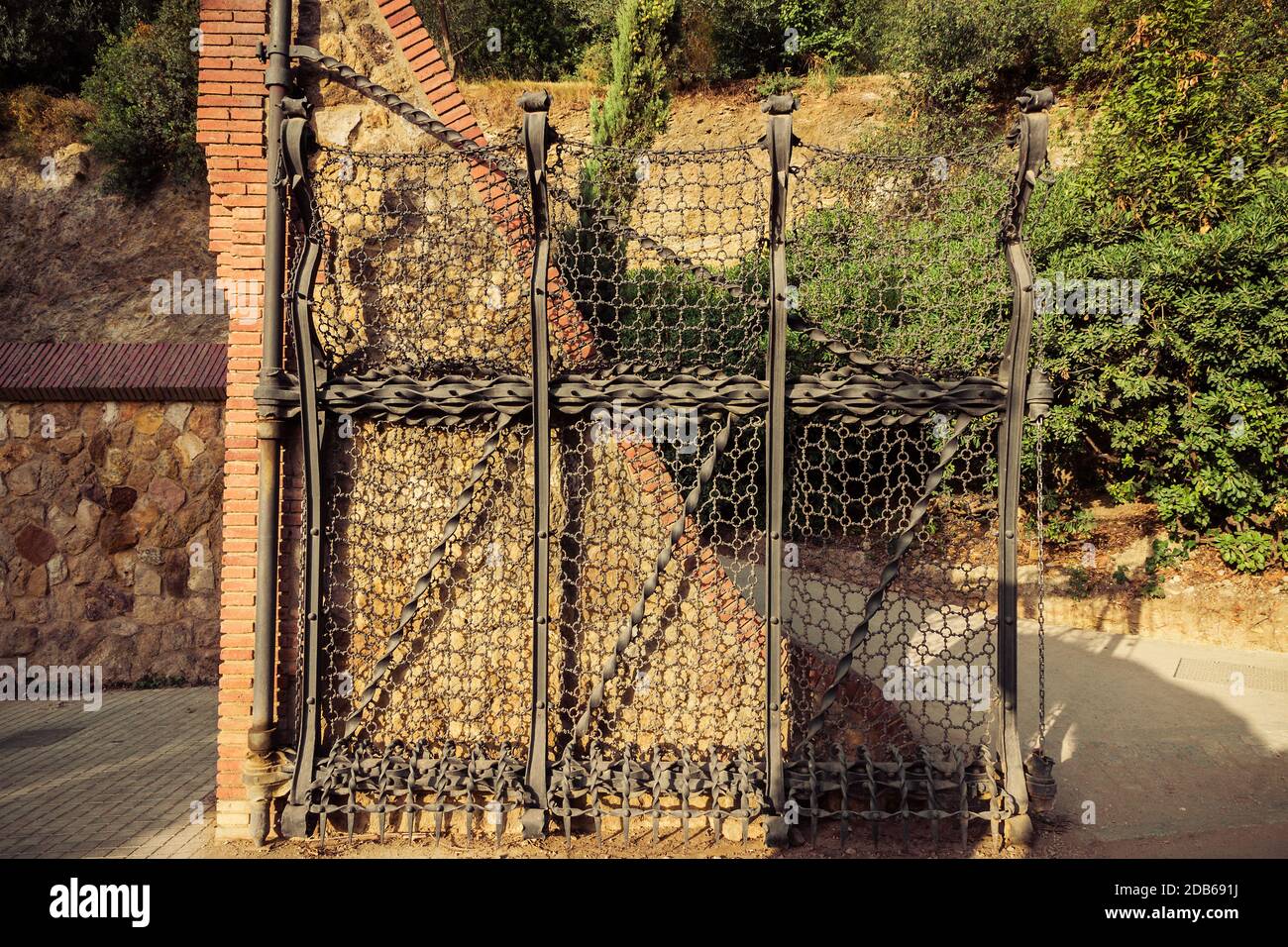 ancient gates in the park Guell , Barcelona. Catalonia. Spain Vintage ...
