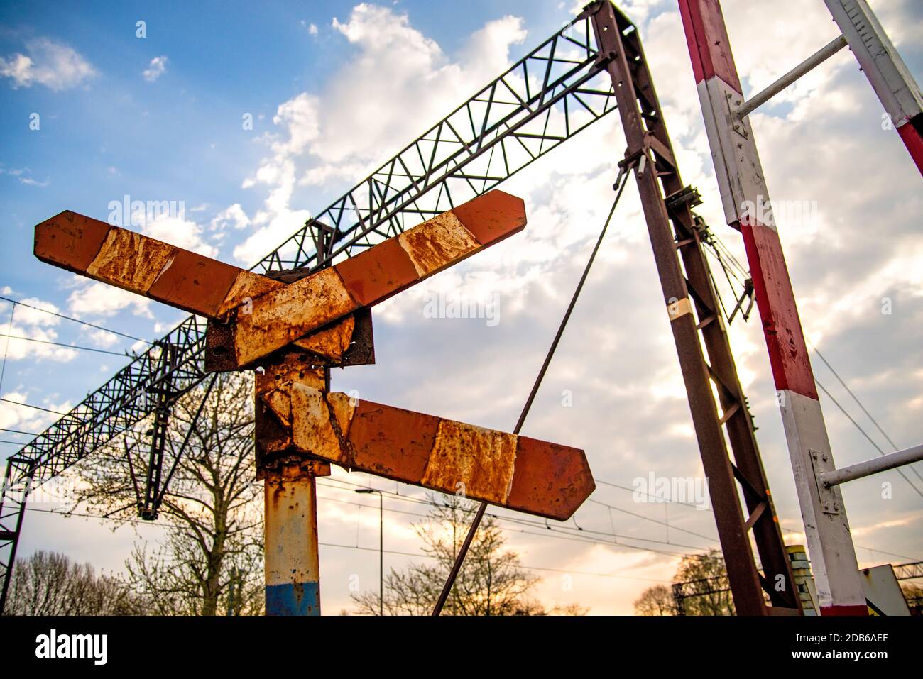 Railway gate with rusty warning sign Stock Photo - Alamy