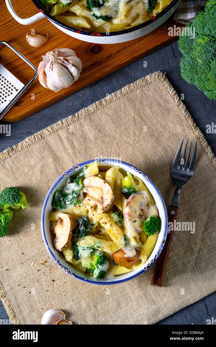 Real pasta with mushrooms, spinach and broccoli Stock Photo - Alamy