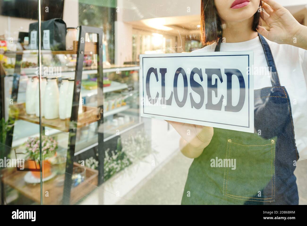 Barista closing coffeeshop Stock Photo - Alamy