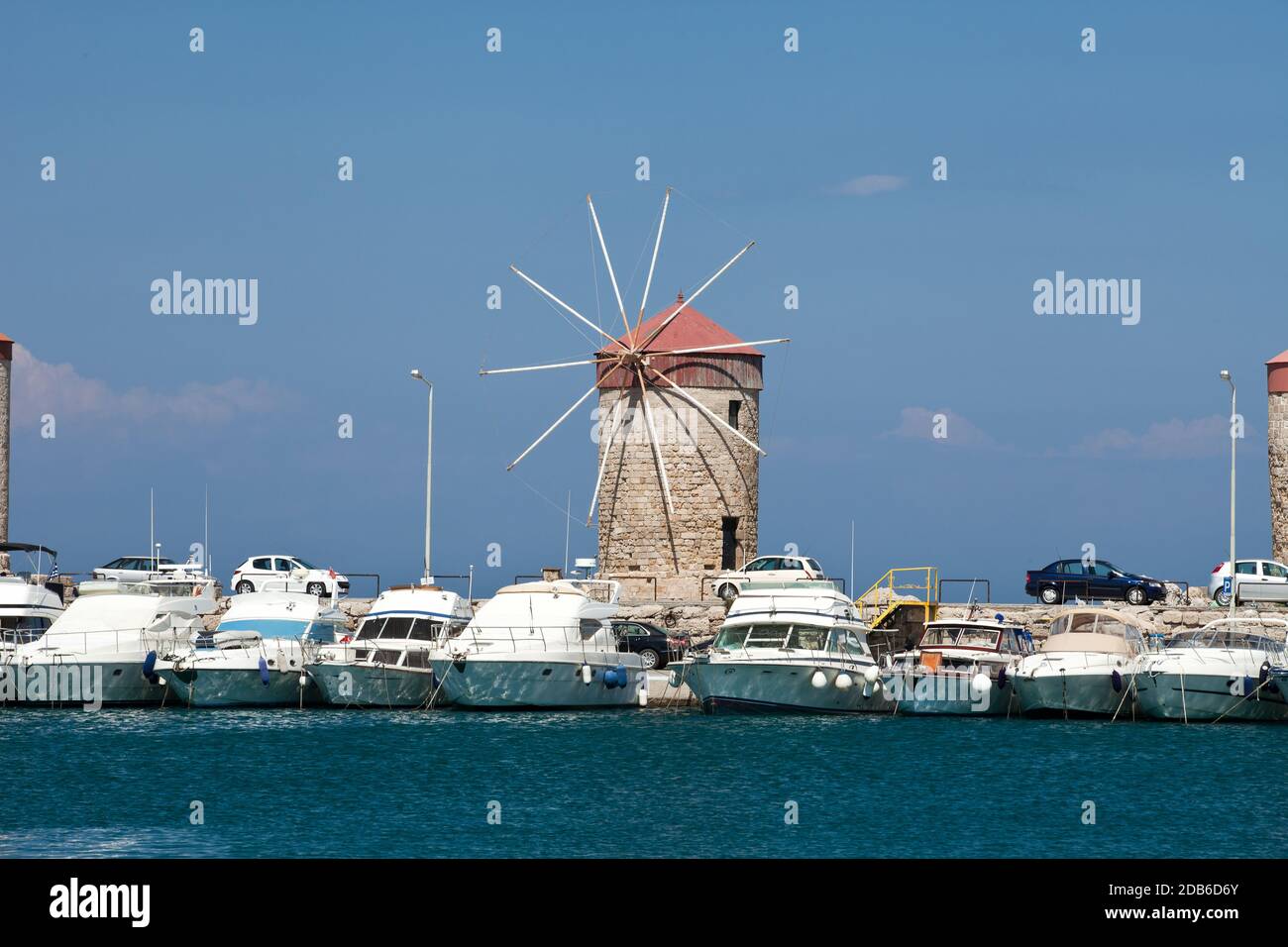 Medieval windmills at Mandraki Harbour in the Dodecanese island of ...