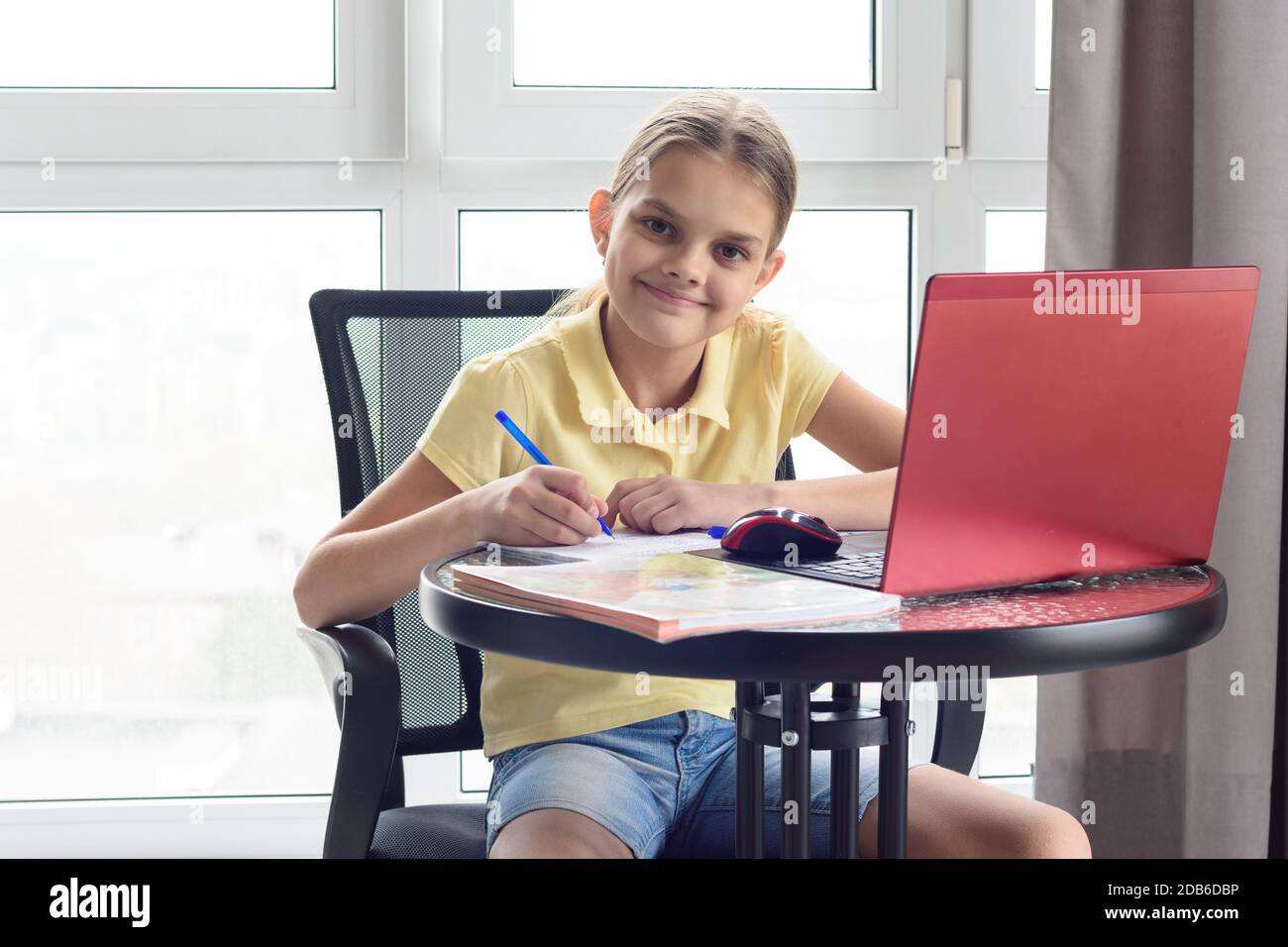 Girl homework table looked hi-res stock photography and images - Alamy